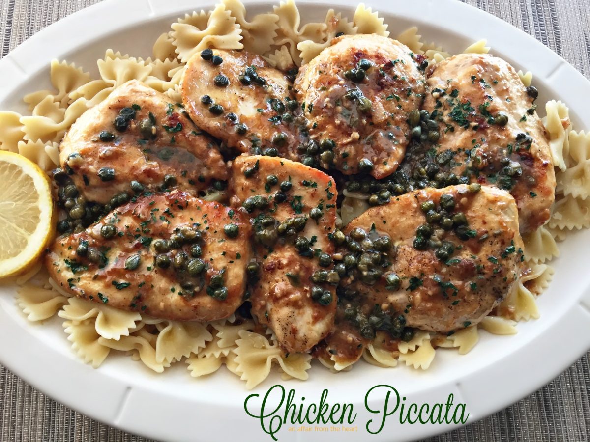 BEST Chicken Piccata Recipe - Buttery, lemon caper chicken over pasta