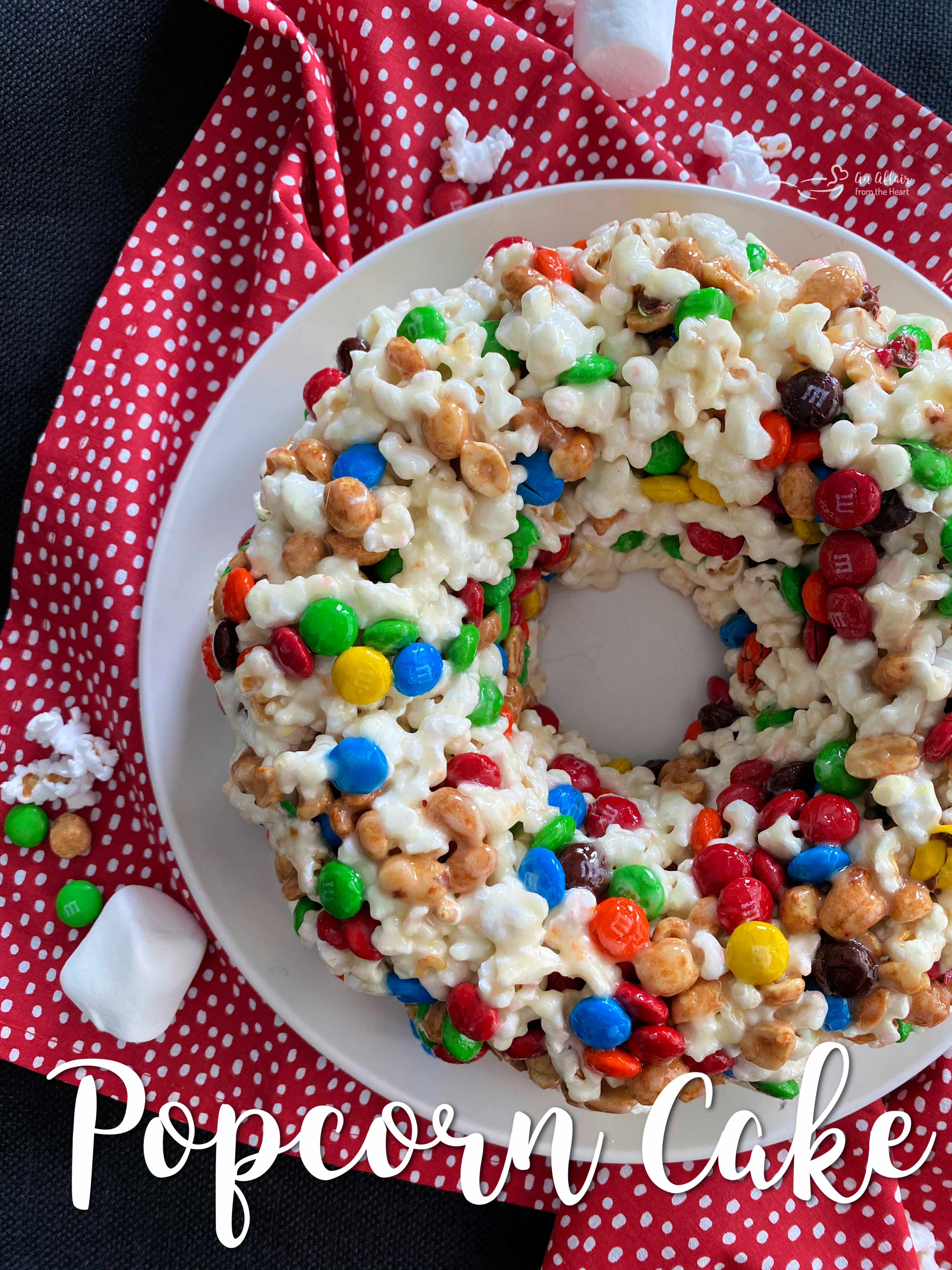 Easy No Bake Popcorn Cake with Marshmallows, M&M's and Peanuts