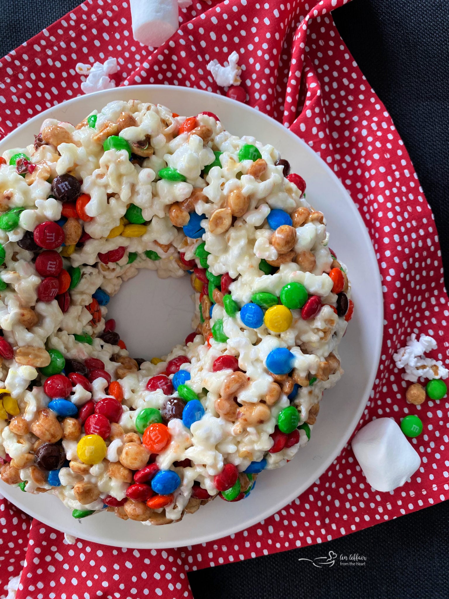 Easy No Bake Popcorn Cake with Marshmallows, M&M's and Peanuts