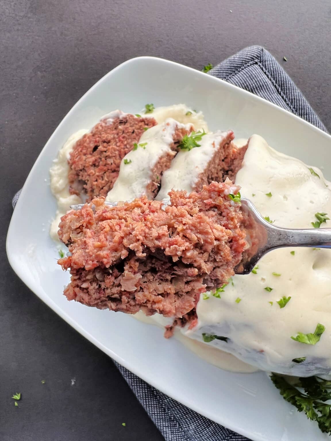 Reuben Meatloaf (Corned Beef Meatloaf + Swiss Cheese Sauce)