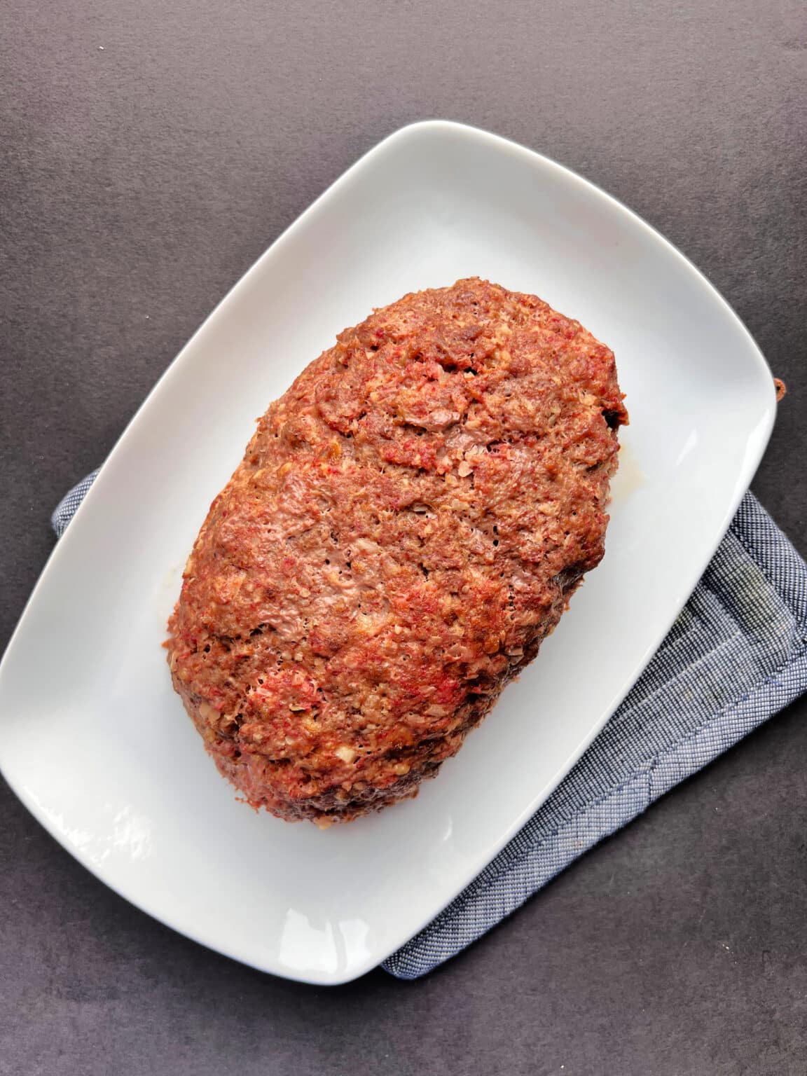 Reuben Meatloaf (Corned Beef Meatloaf + Swiss Cheese Sauce)