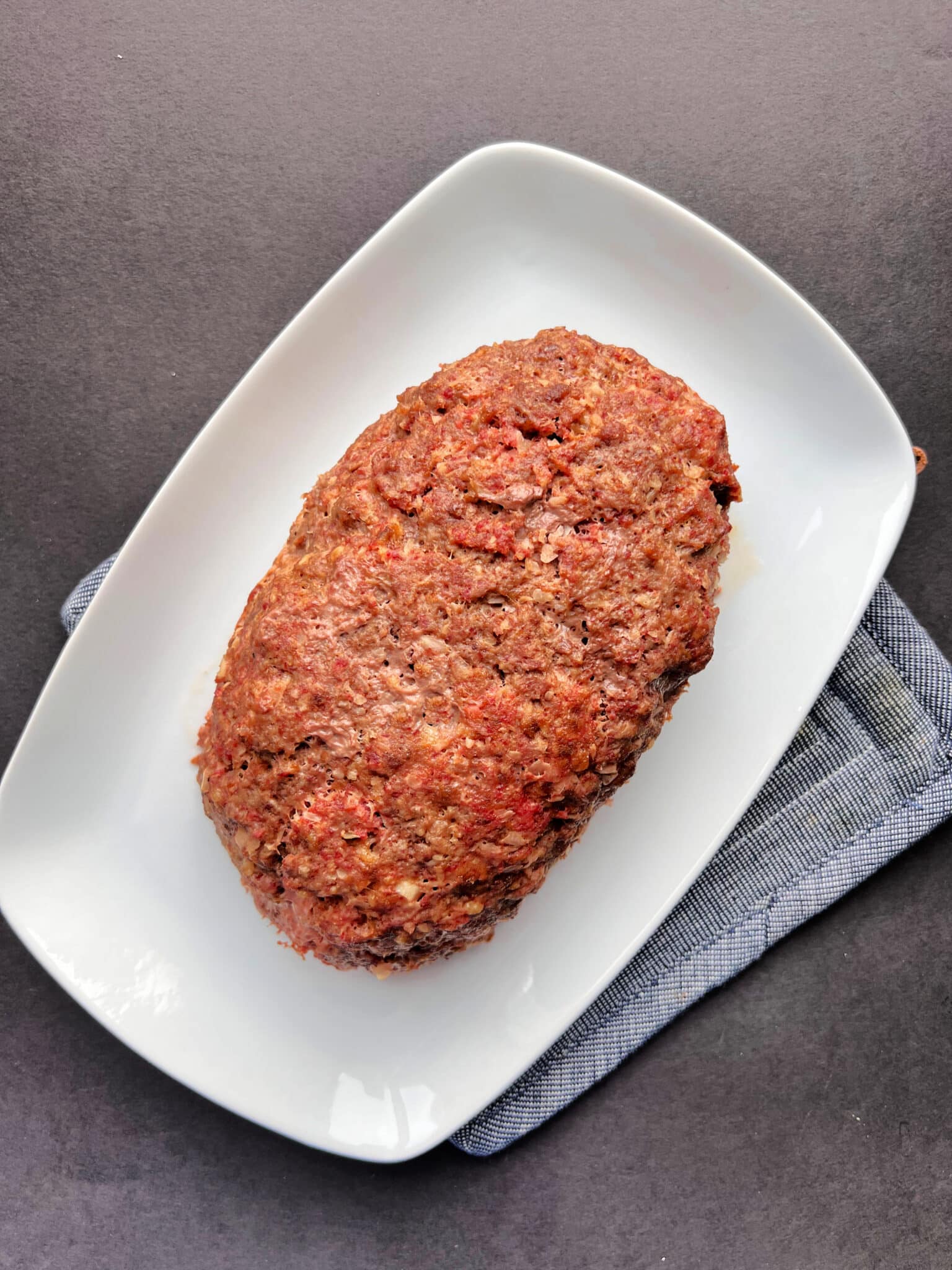 Reuben Meatloaf (Corned Beef Meatloaf + Swiss Cheese Sauce)